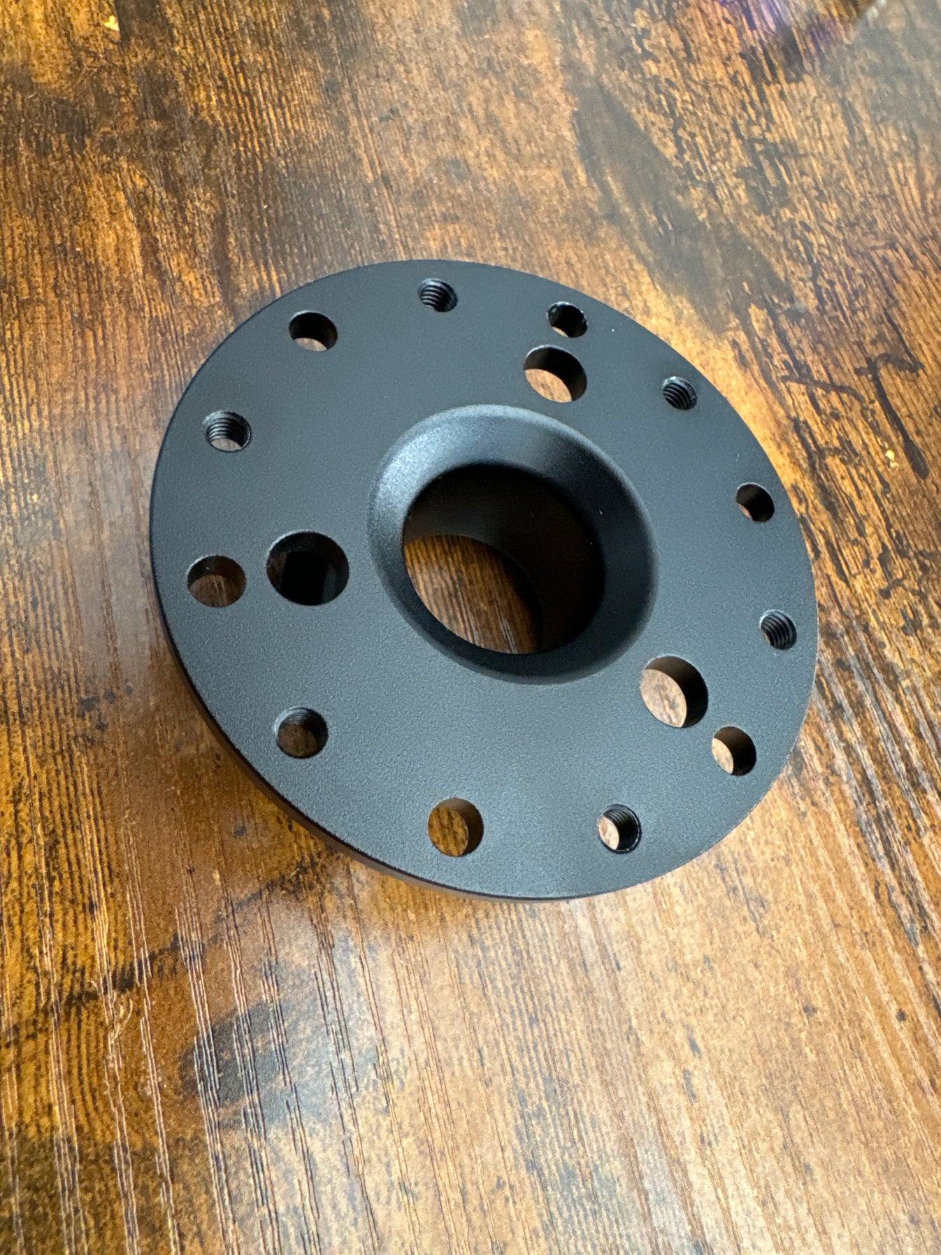 Black 50mm to 70mm Hub Adapter – Delta Sim Technologies